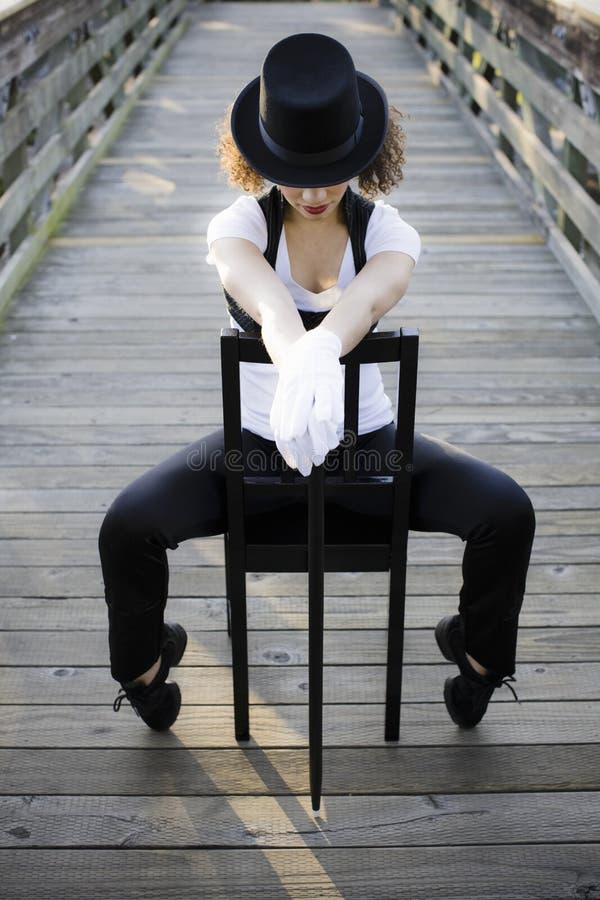 Jazz Dancer Sitting on Chair Stock Image - Image of balance, mixed ...