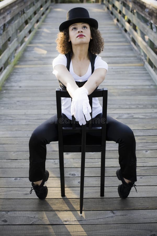 Jazz Dancer Sitting on Chair Stock Image - Image of balance, mixed ...