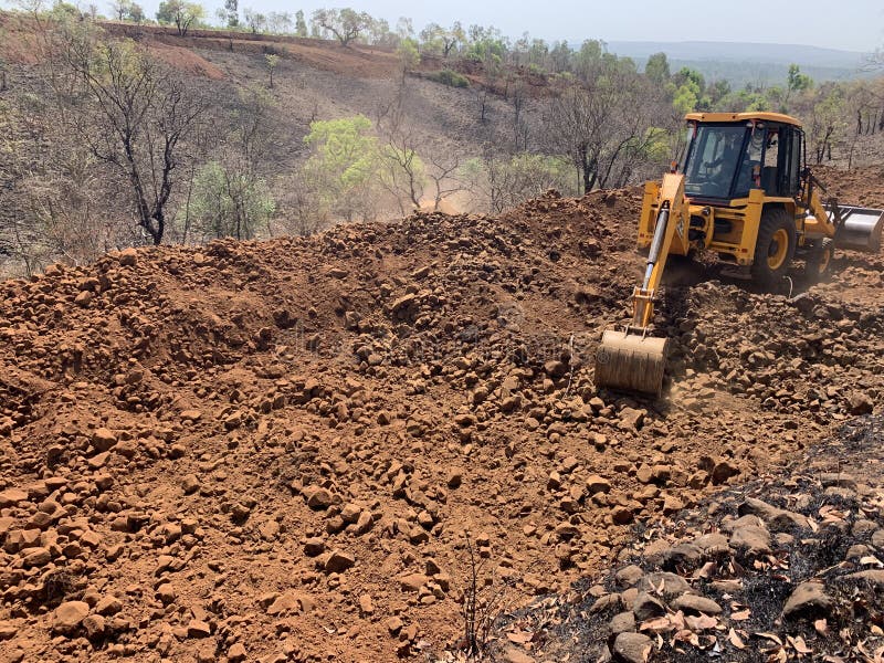 JCB Performs Excavation Work on the Construction Site. Stock Photo - Image of site, machine ...