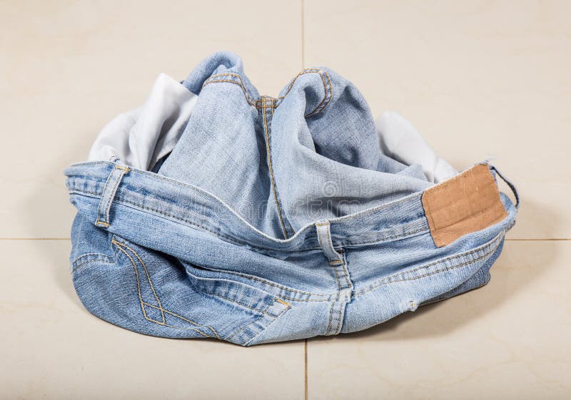 Jeans on the floor stock image. Image of slim, fashion - 56795063