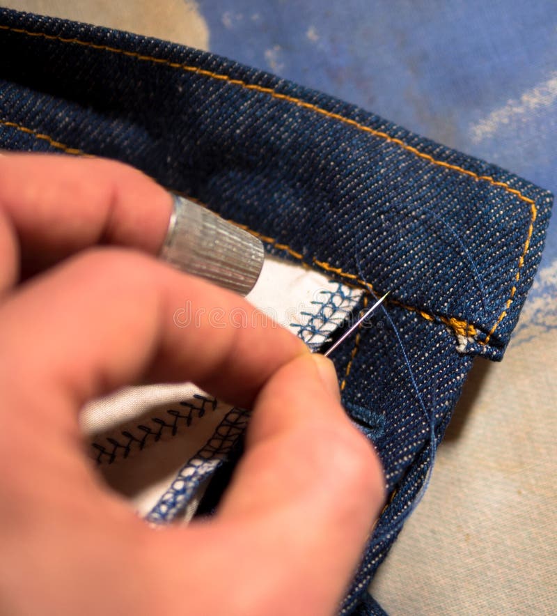 Jeans is hand sewn stock image. Image of clothes, hand - 81449415
