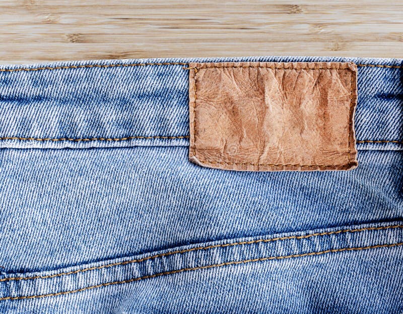 Jeans label on blue Jeans stock photo. Image of closeup - 314627392