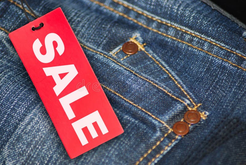 Jeans with Sale Tag stock photo. Image of selling, attached - 22629394