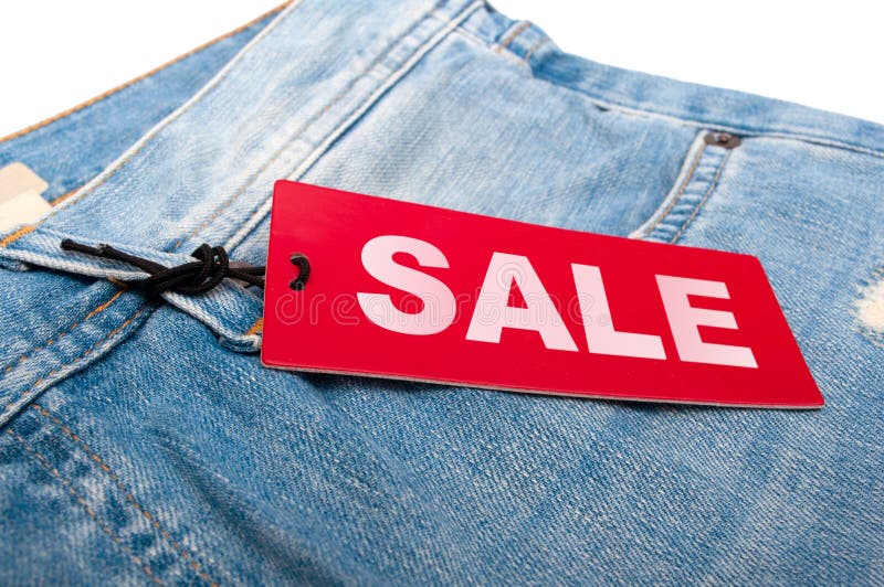 Jeans with Sale Tag stock photo. Image of paper, attached - 23298582