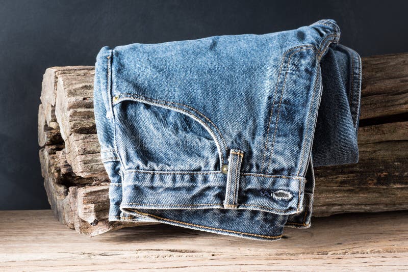Jeans with tree stump stock image. Image of fabric, denim - 49999283