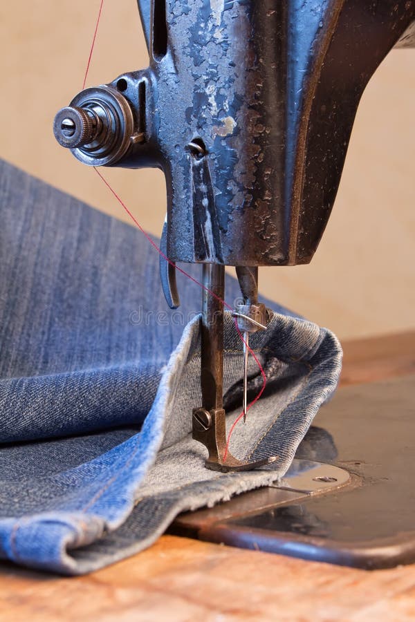 Jeans and a Vintage Sewing Machine Stock Image - Image of needle ...