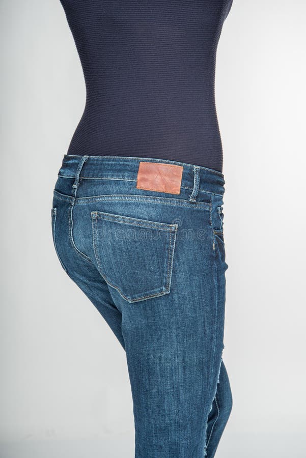 Jeans on a woman rear view stock image. Image of pocket - 75836663