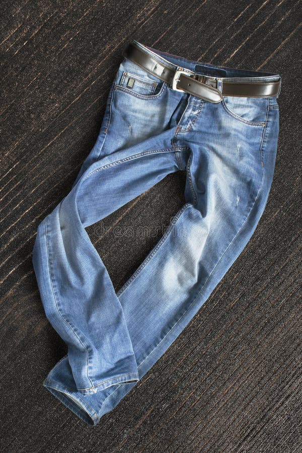 Crumpled Jeans on Floor stock image. Image of cotton - 48531261