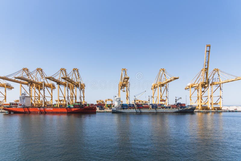 Jebel Ali, UAE - Large Container Cargo Ships Berthed Under Gantry ...