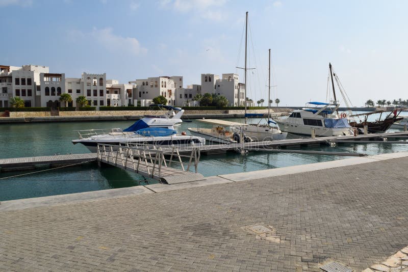 L Sifah in Oman with White Sand Beach and Dunes and Surrounded by ...