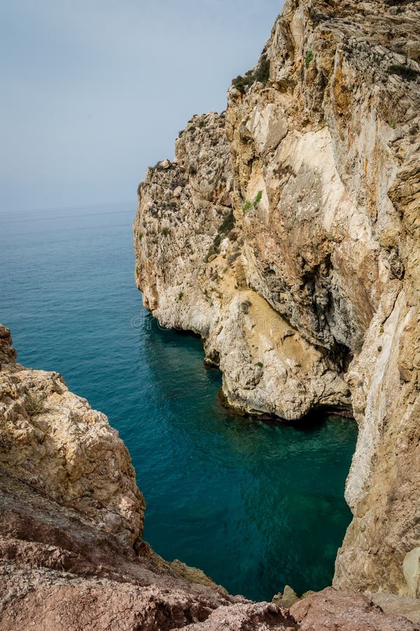 Jebha Beach and Waves and Rocks Stock Photo - Image of boats ...