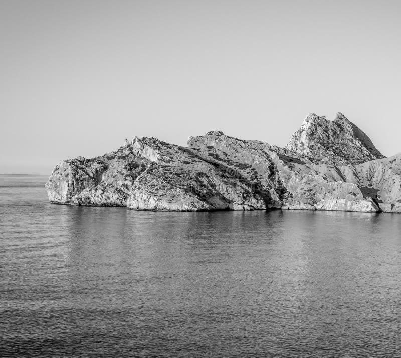 Jebha Island and Waves and Rocks Stock Photo - Image of mers, island ...