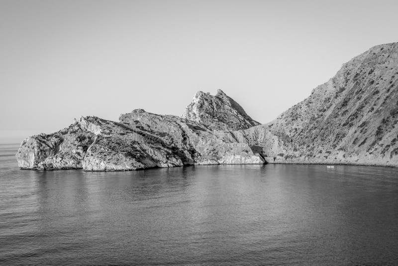 Jebha Island and Waves and Rocks Stock Photo - Image of island, resort ...