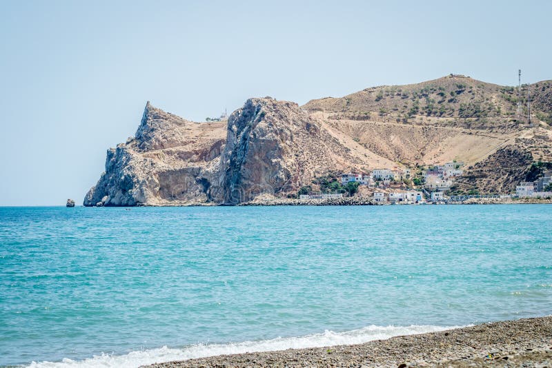 Jebha Island and Waves and Rocks Stock Photo - Image of birds ...