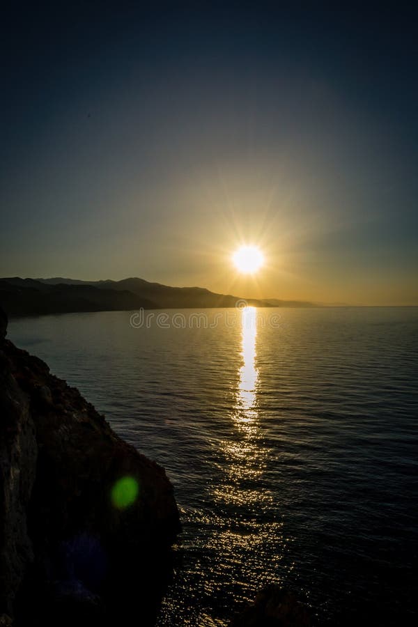 Jebha Sunset Island and Waves and Rocks Stock Image - Image of birds ...