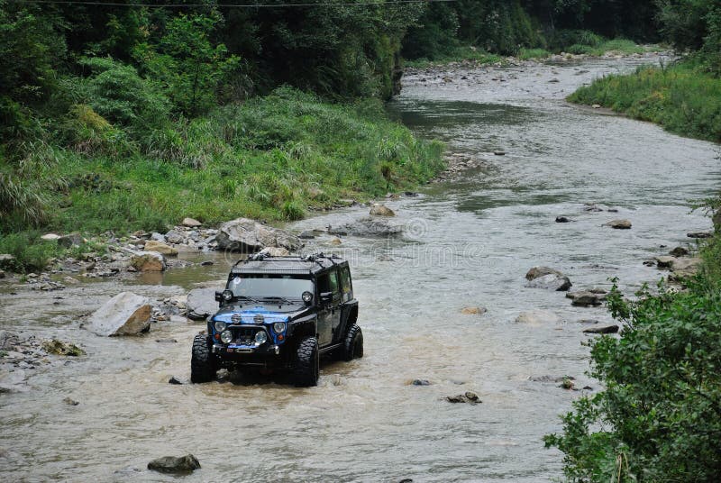 Jeep crossing the river stock image. Image of transportation - 33366661