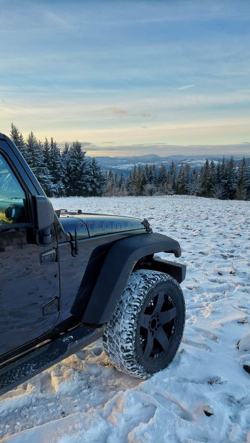 Jeep Wrangler in the Mountains at Sunset. Snowy Mountains 4x4 Stock ...