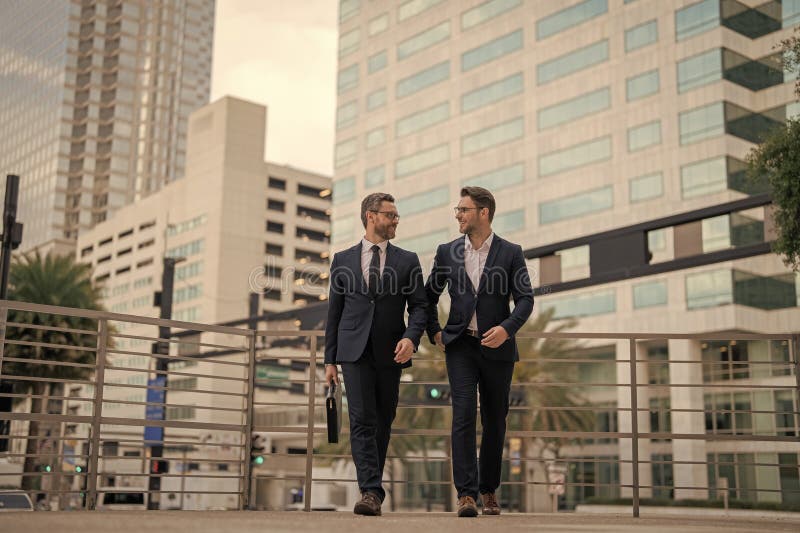 Successful Business Leader Boss Walking Outdoor. Photo of Two ...