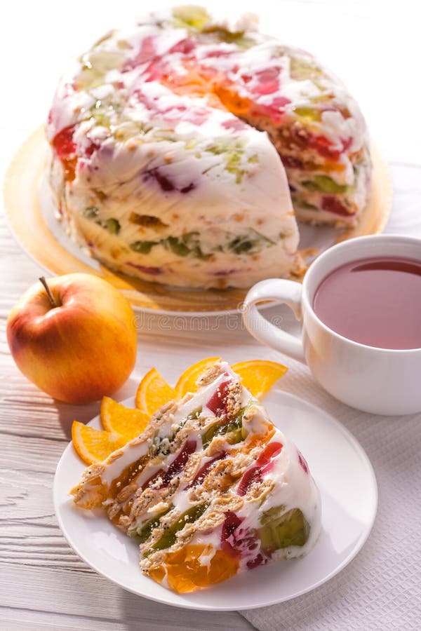 Jelly Cake with Tea and Fruit on the Table Stock Photo - Image of ...