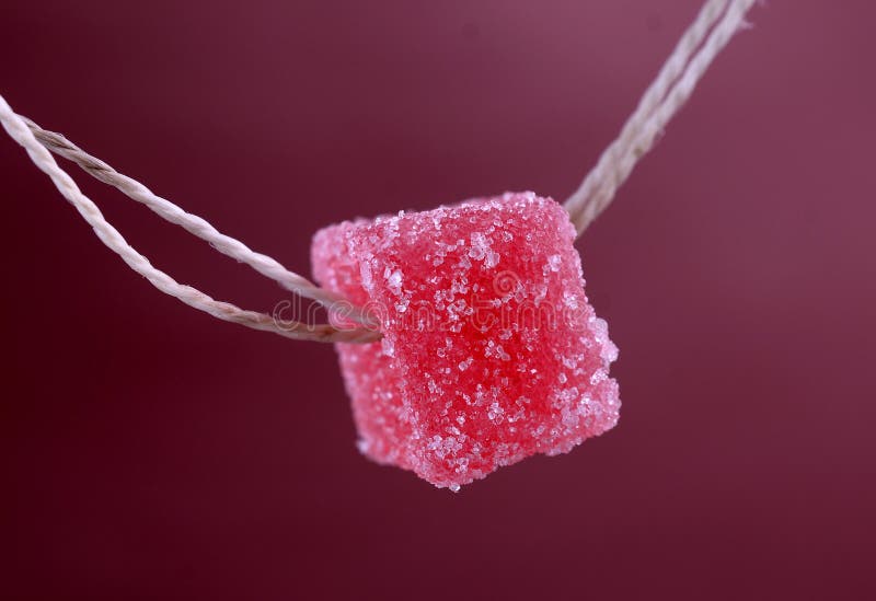 Jelly Candy Red in Sugar Hanging on a Rope Stock Image - Image of ...