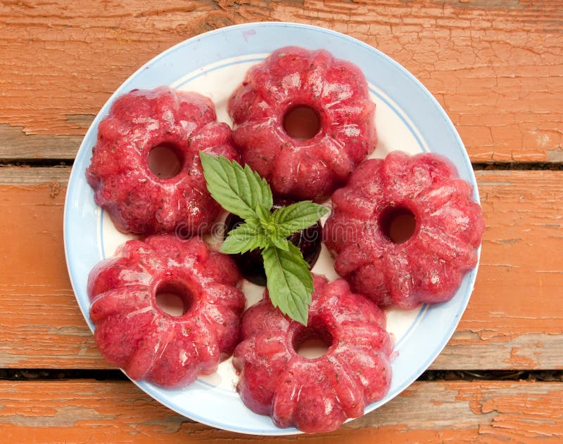 Jelly on a wooden table stock photo. Image of dish, raspberry - 22377034