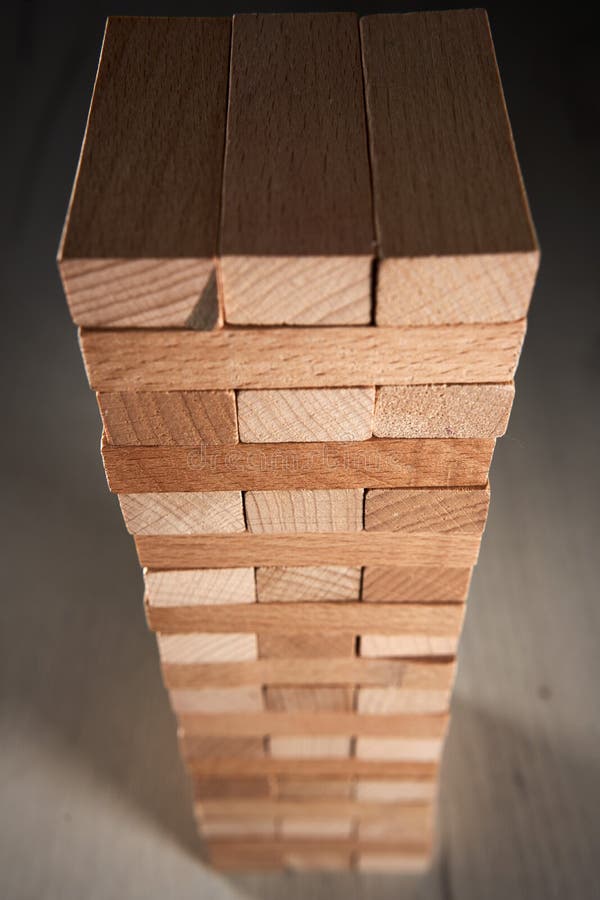 Jenga game on a table stock photo. Image of brick, isolated - 265613004