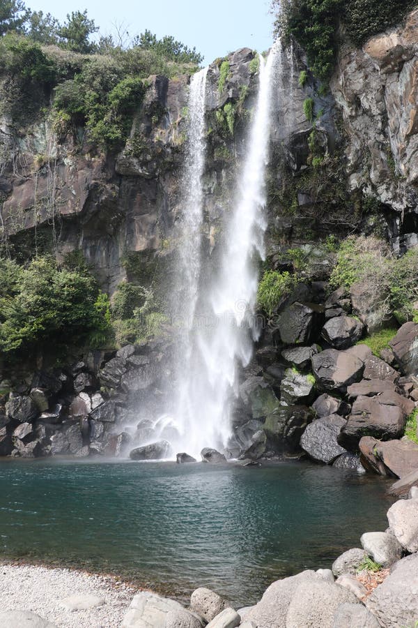 Jeongbang Waterfall on Jeju Island Stock Image - Image of tourism ...