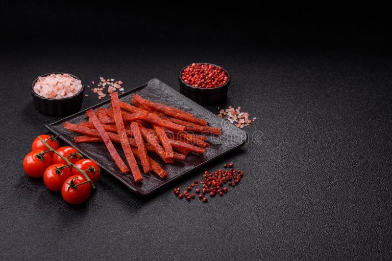 Jerky Dried Fish Sticks with Salt and Spices Stock Photo - Image of ...