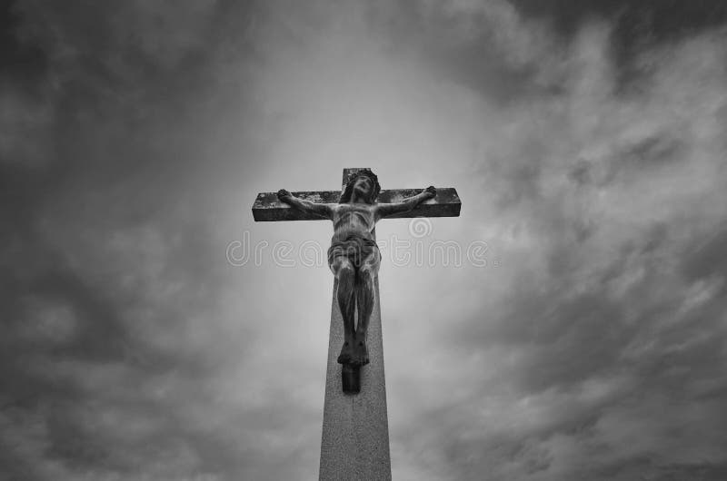 Jesus Christ on the Cross Standing on the Light Against Dramatic Cloudy ...
