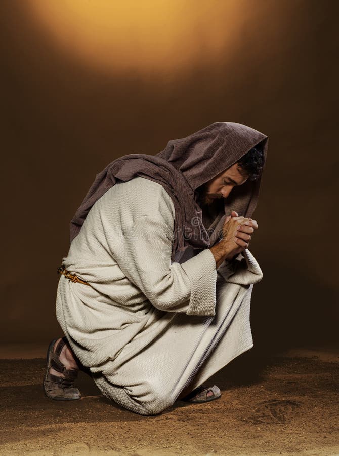 Jesus Christ praying stock photo. Image of devotion - 215362138
