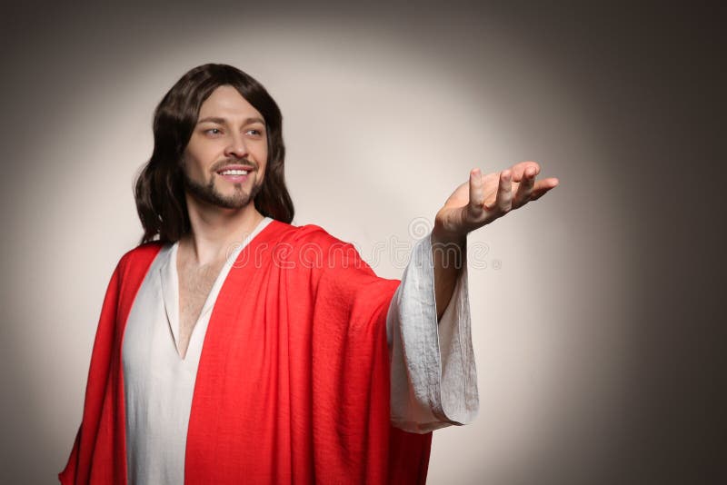 Jesus Christ Reaching Out His Hand on Beige Background Stock Photo ...