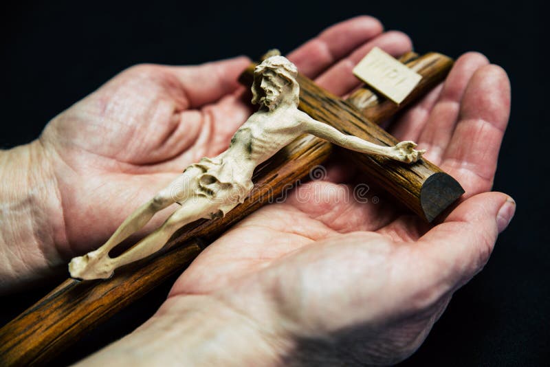 Jesus on cross in hands stock photo. Image of symbol - 87285774