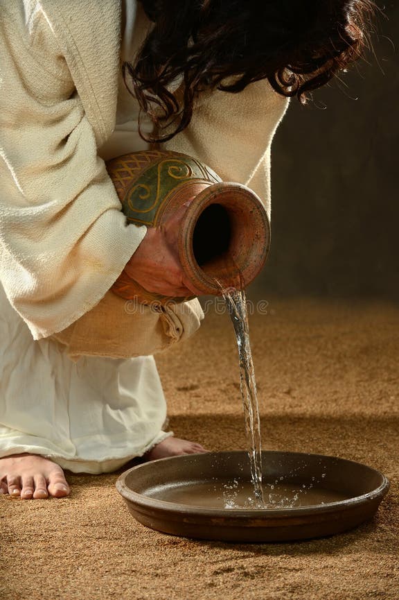 Jesus Pouring Water into Container Stock Image - Image of spiritual ...