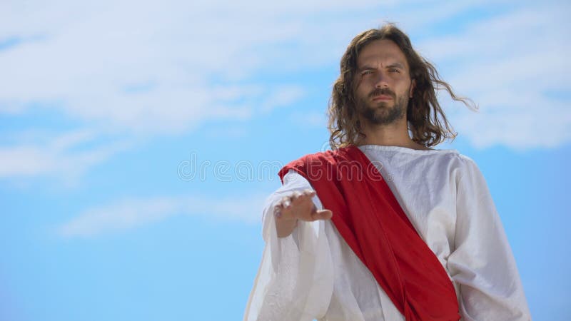 Jesus in Robe Showing Christian Cross, Crucifixion Symbol, Dark ...