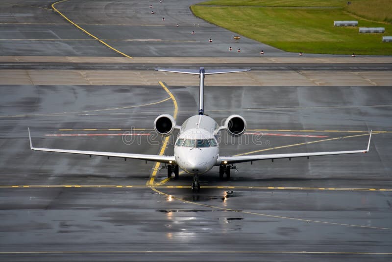 Jet airliner on runway stock image. Image of city, plane - 5527179