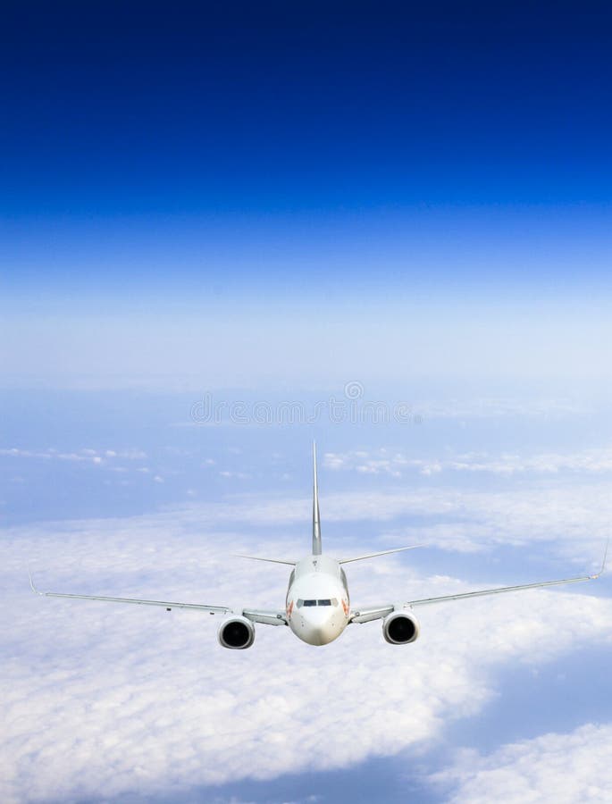 Passenger Jet Plane Flying Low Over Rough Water Stock Photo - Image of ...