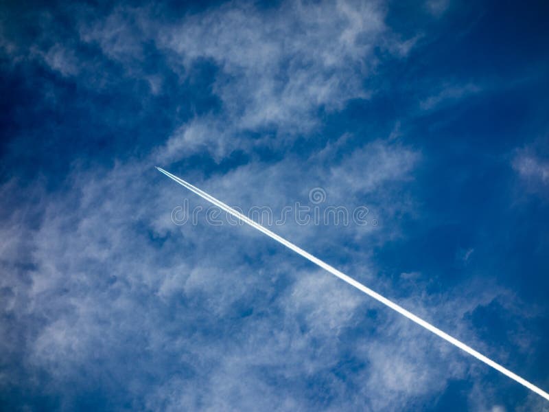 Jet Airplane Contrails stock image. Image of travel, thin - 53013847