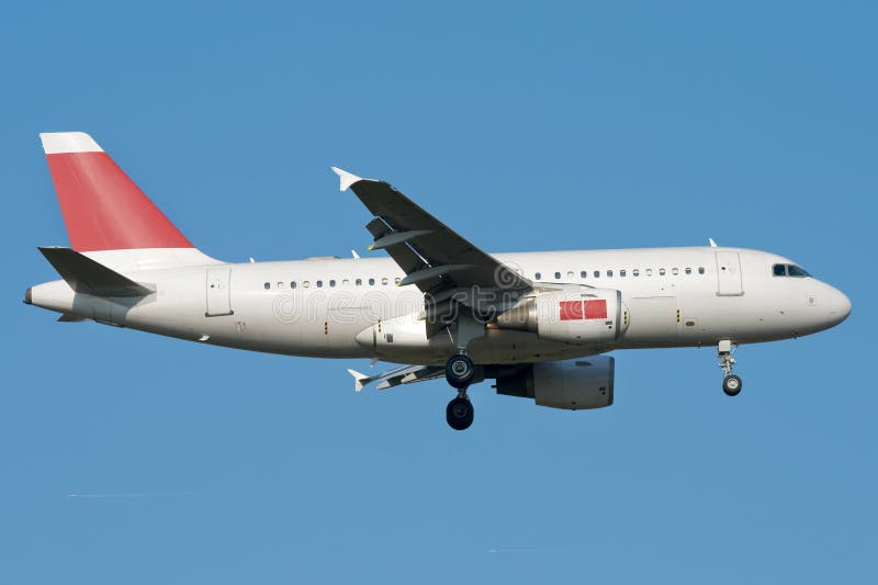 Jet airplane landing stock photo. Image of tourism, transportation ...