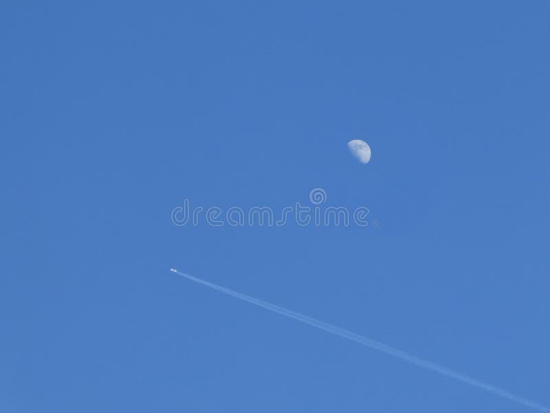Jet Airplane and Moon in the Blue Sky Stock Image - Image of moon ...