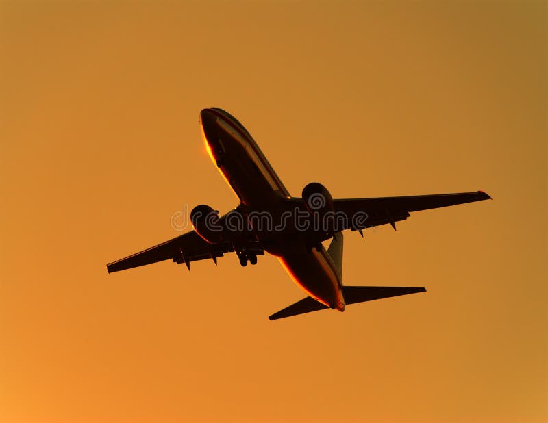 Jet Airplane Under Morning Sun Stock Photo - Image of airliner ...