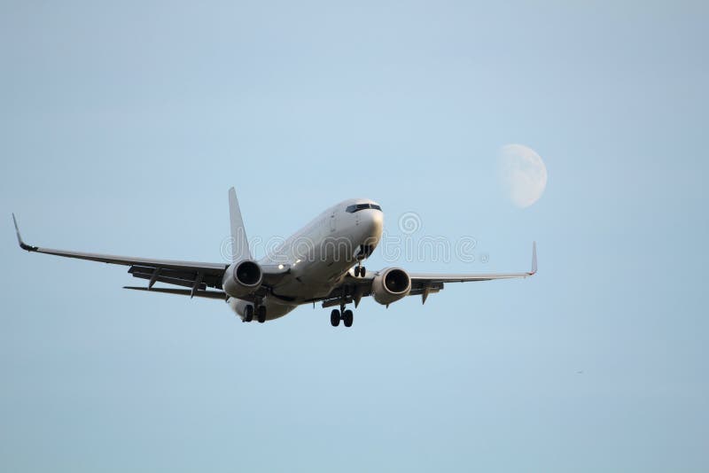 Jet on Approach, Moon stock image. Image of arrival, gear - 17578417