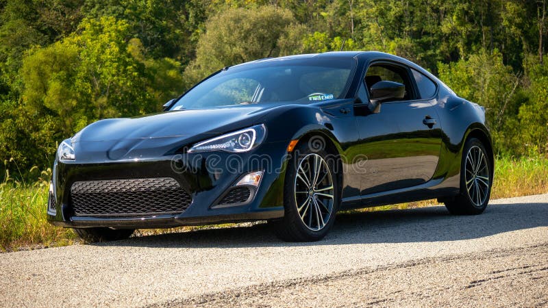 Jet-black Two-door Scion Car on the Road. Editorial Photography - Image ...