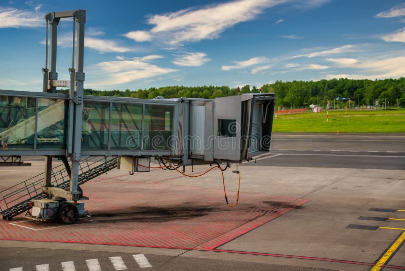 Jet bridge in airport. stock photo. Image of glass, gangway - 253851852