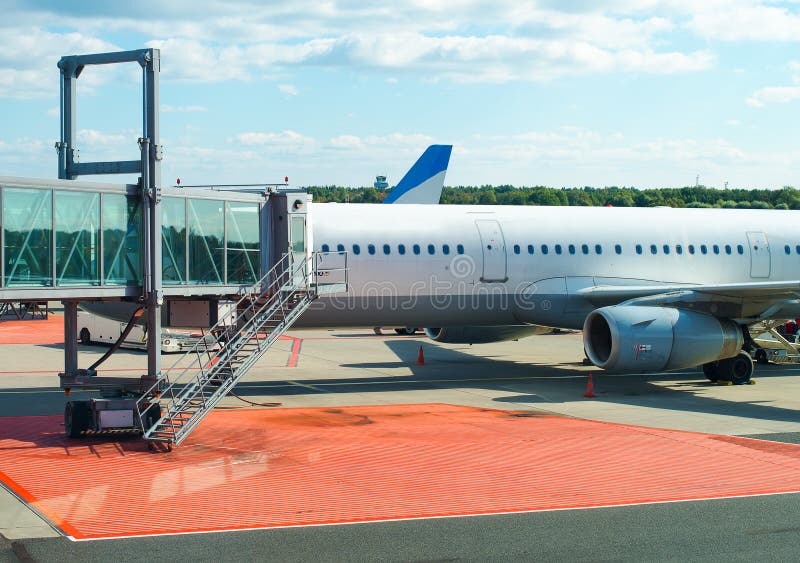 Jet bridge in airport. stock photo. Image of glass, gangway - 253851852