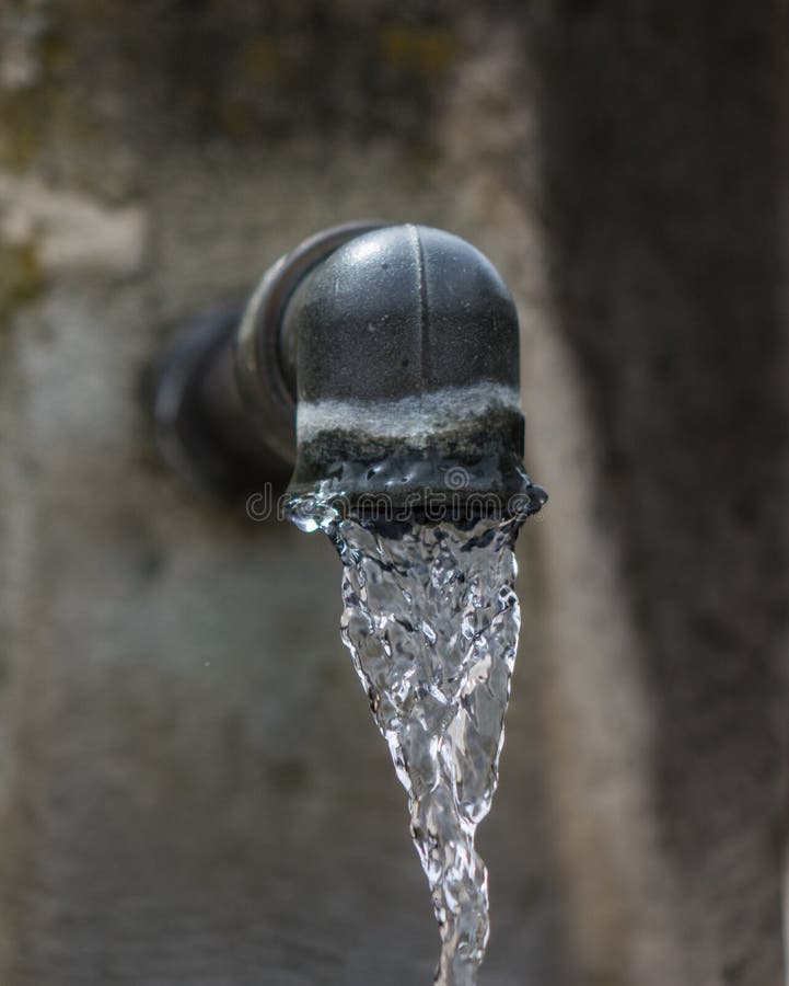 The Jet of Drinking Water from the Spring Crane Stock Photo - Image of ...
