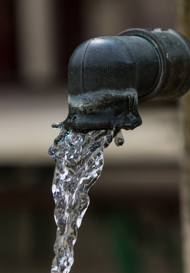 The Jet of Drinking Water from the Spring Crane Stock Image - Image of ...