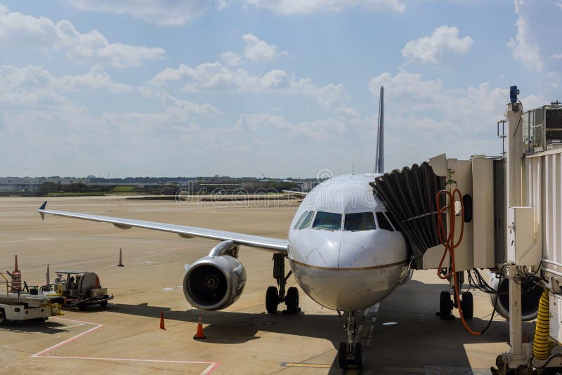 Jet Engine Against a Plane at the Airport on Loading Stock Photo ...