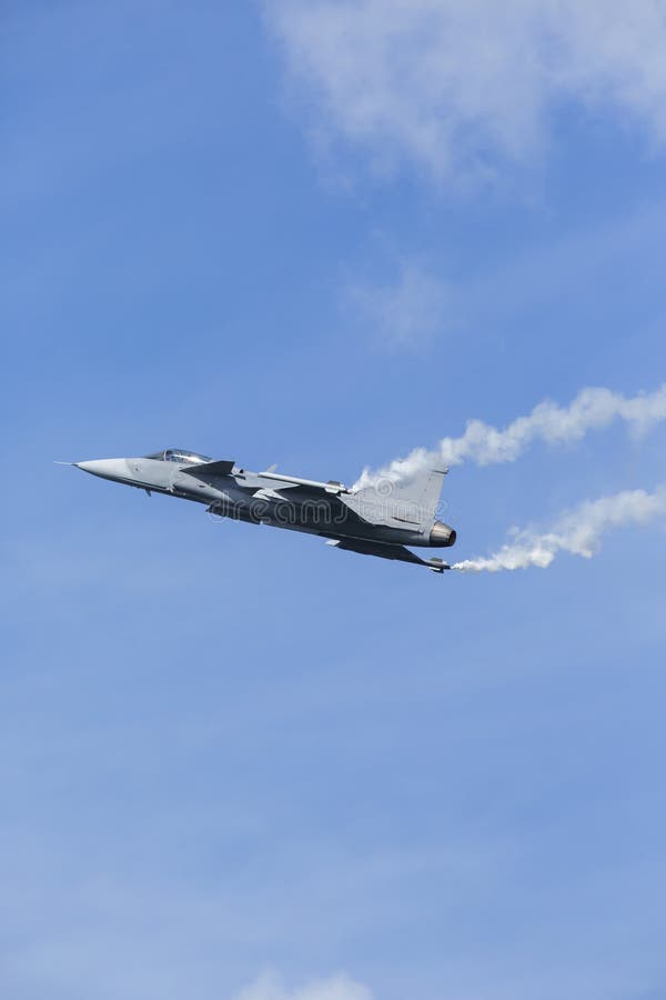 Jet Fighter Flying with White Smoke Stock Photo - Image of military ...
