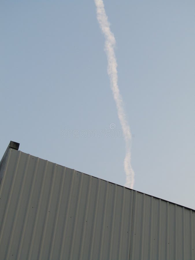 Jet Flight Smoke Goes through the Roof Stock Photo - Image of wing ...