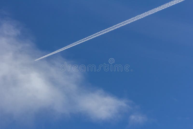 Jet flying into clouds. stock photo. Image of cloud, jetstream - 90118852